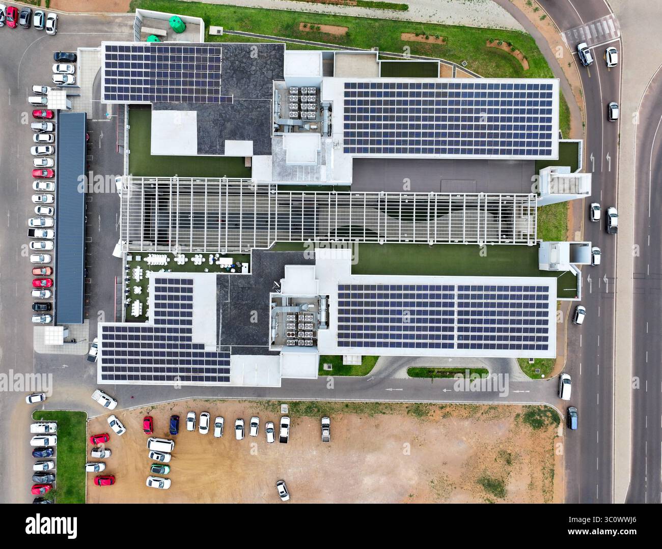 sustainable energy solar panels on building roof aerial view Gaborone ...