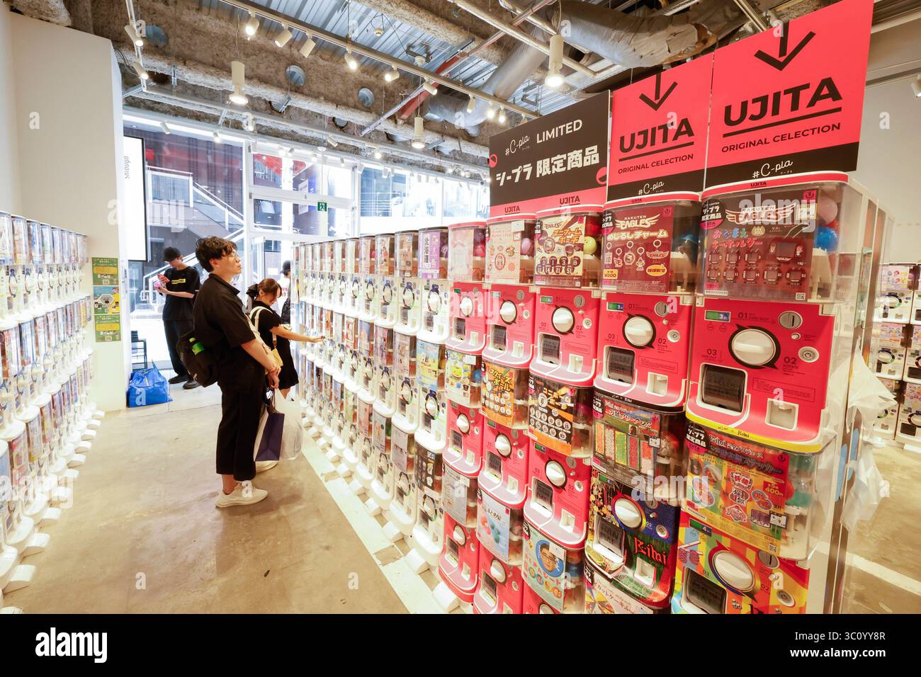 Toy in a capsule vending machine hi-res stock photography and images ...