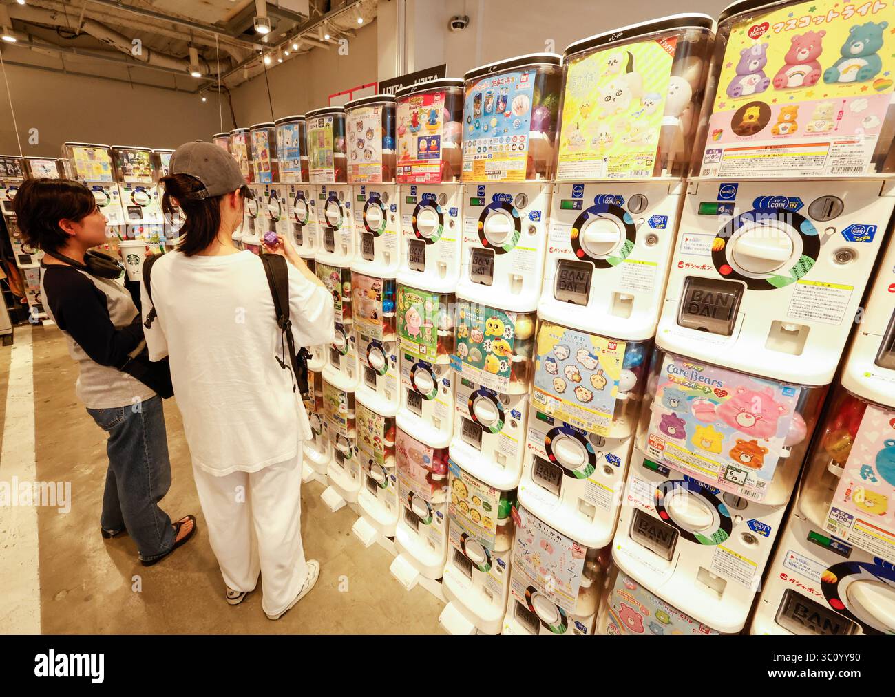Toy in a capsule vending machines hi-res stock photography and images ...
