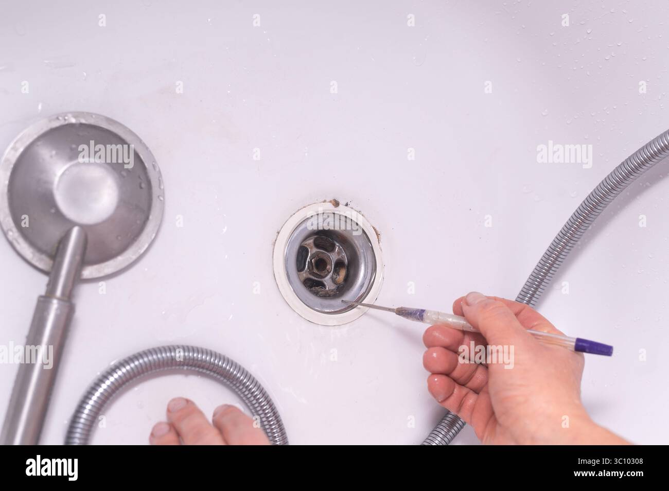 Removal of blockage in the sink hi-res stock photography and images - Alamy