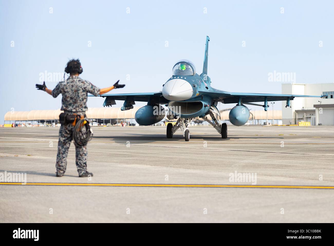 A Japan Air Self Defense Force member assigned to 8th Tactical Fighter ...