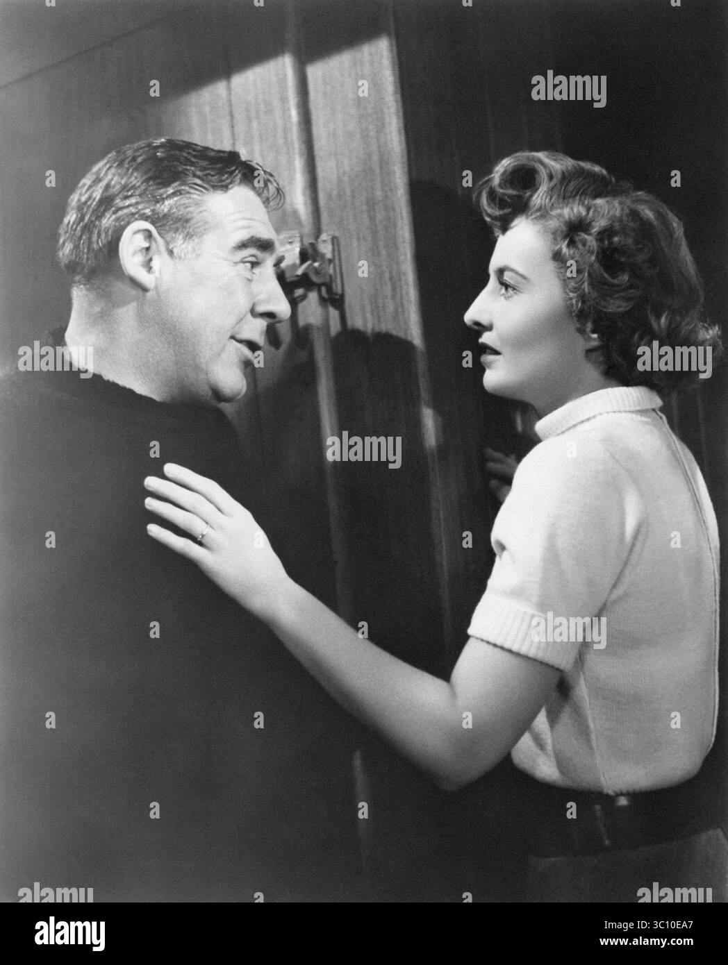 American actress Barbara Stanwyck (Ruby Catherine Sevens) looking into ...