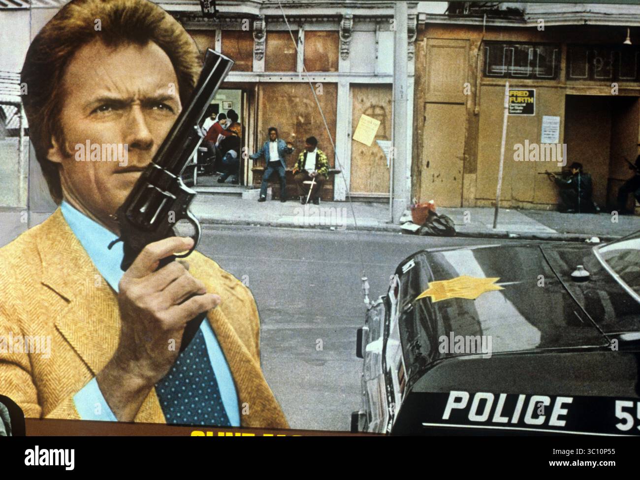 American actor, director and film producer Clint Eastwood holding a gun ...