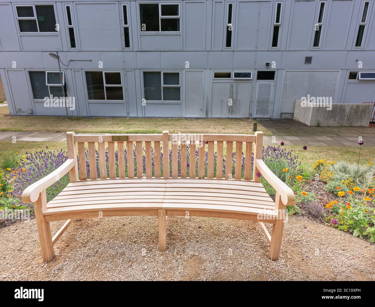 Bench in the mini garden at the Willowbrook Health Centre, Willowbrook ...