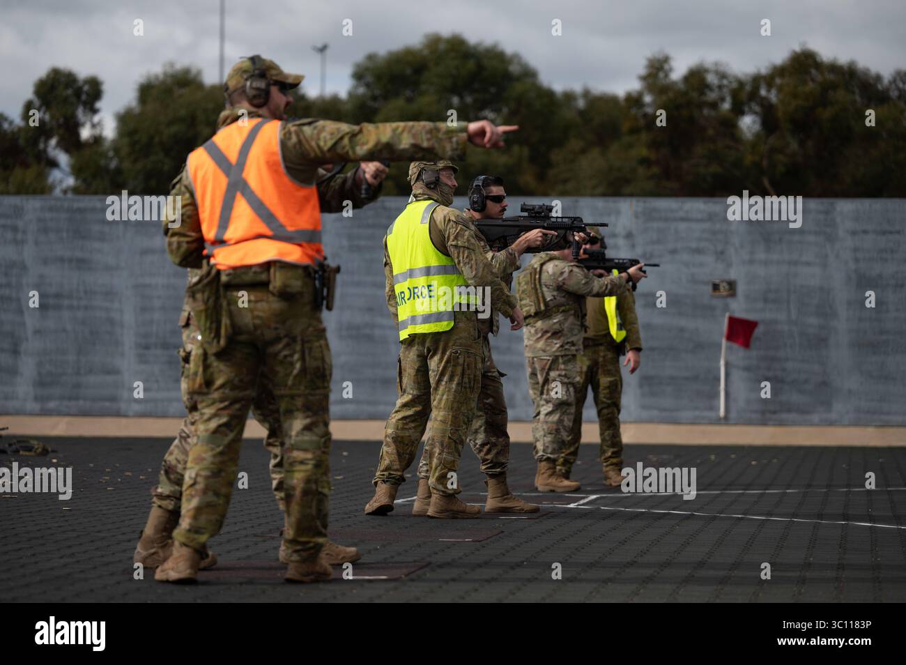 Royal Australian Air Force weapon training section instructors teach U ...