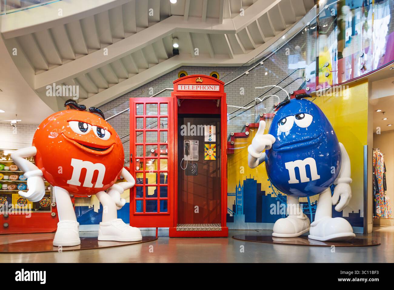 Giant M and M Character Statues Flank Classic British Phone Booth ...