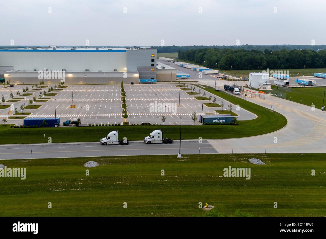 An aerial view captures the vast scale of an Amazon Fulfillment Center ...