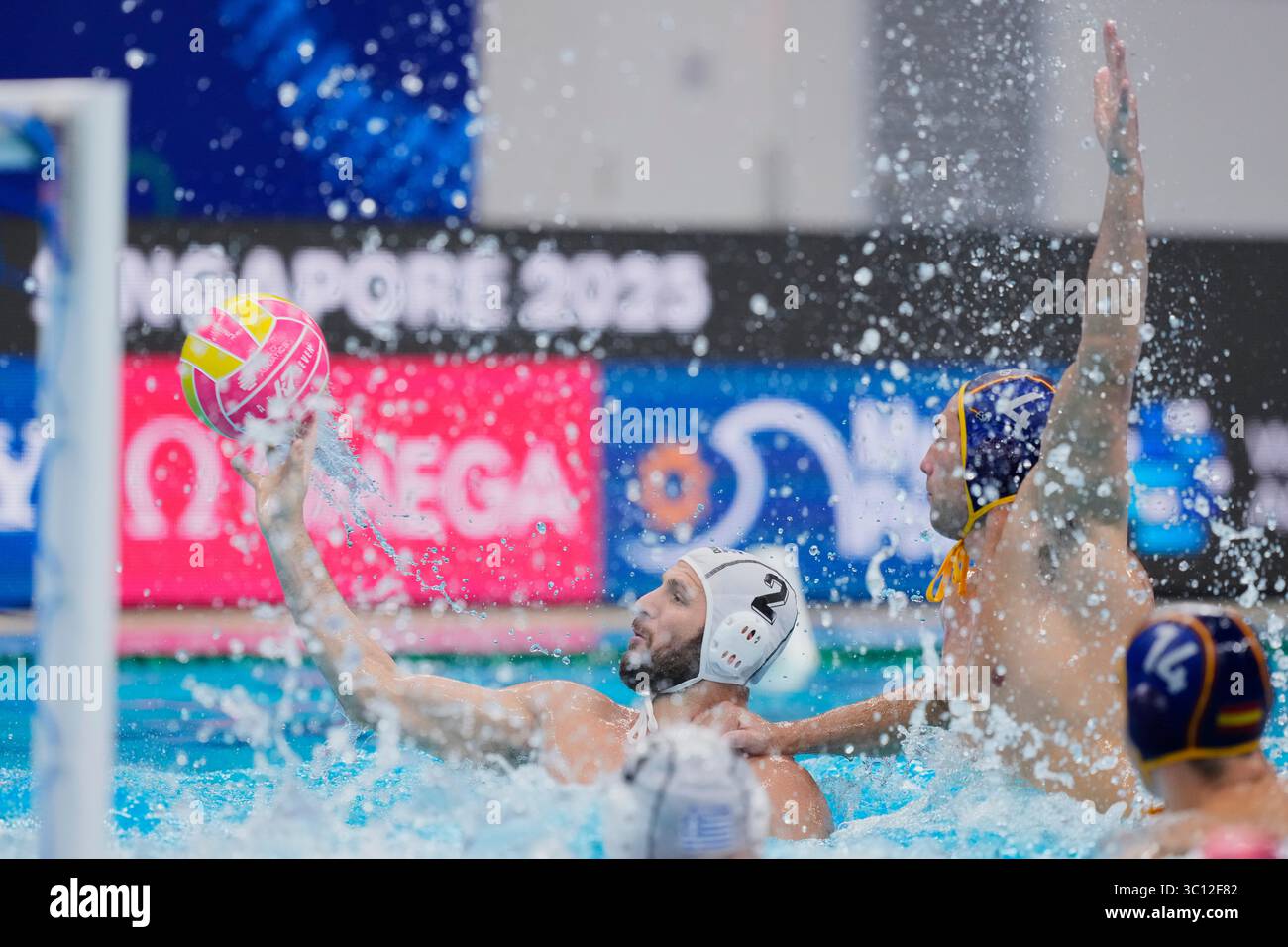 Greece's Konstantinos Genidounias, left, and Spain's Bernat Sanahuja ...
