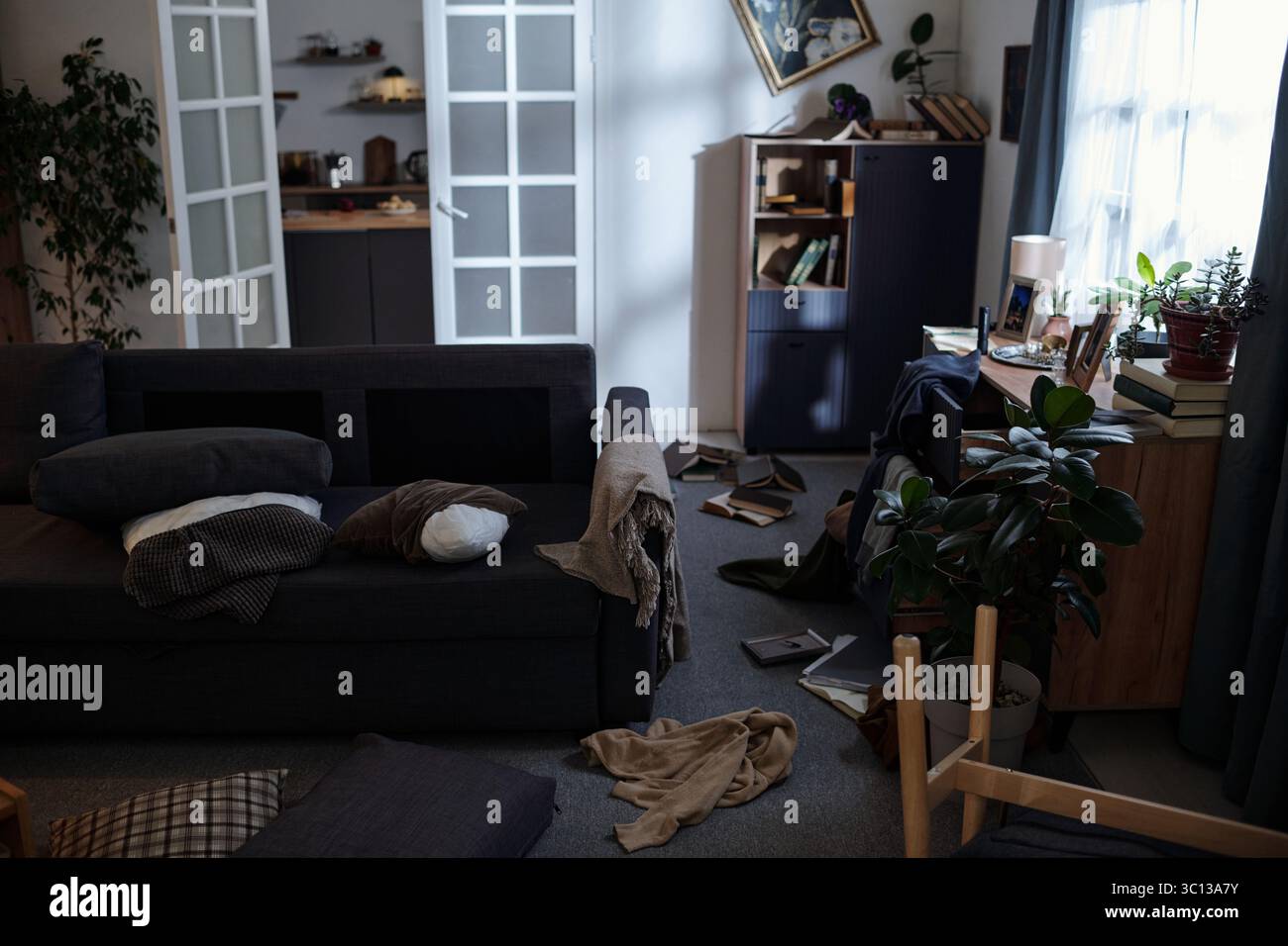 Messy Living Room Interior Showing Books Scattered and Furniture ...