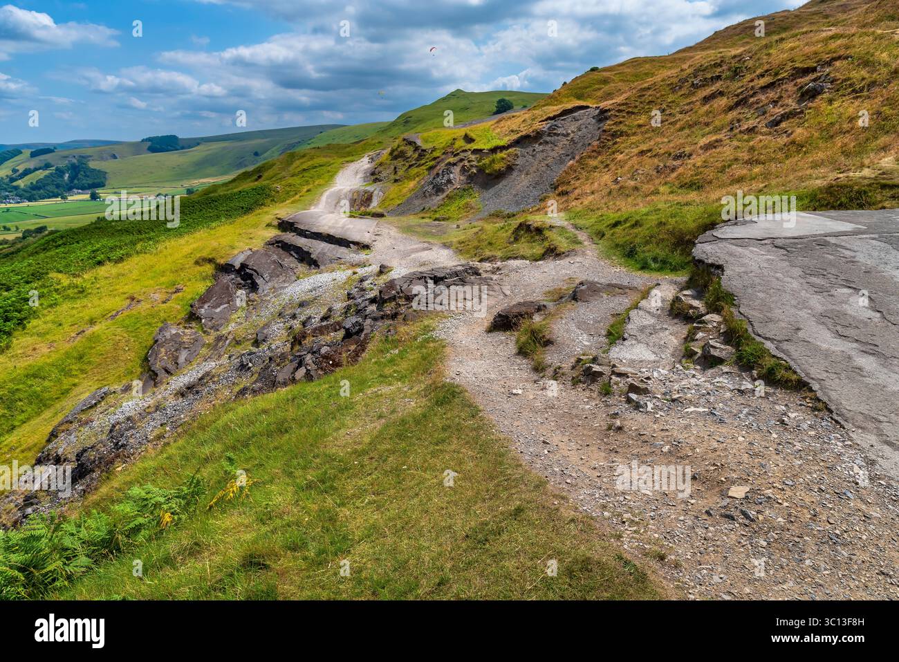 The old 'Broken Road' that once ran up the landslip of Mam Tor, now ...