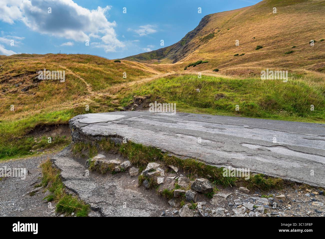 The old 'Broken Road' that once ran up the landslip of Mam Tor, now ...