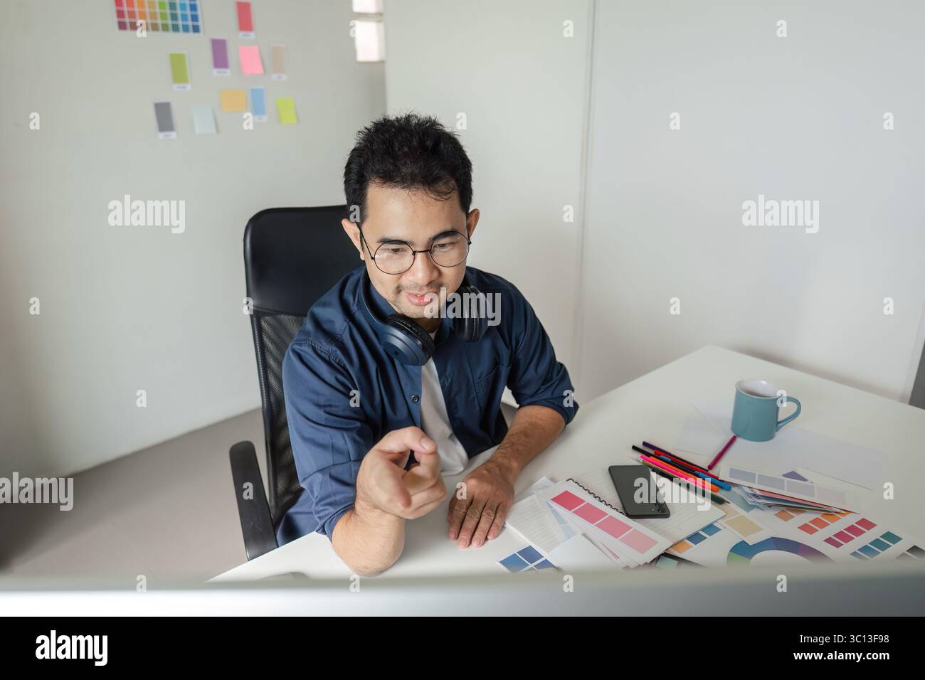 Creative Graphic Designer Working in Modern Design Studio with Color ...