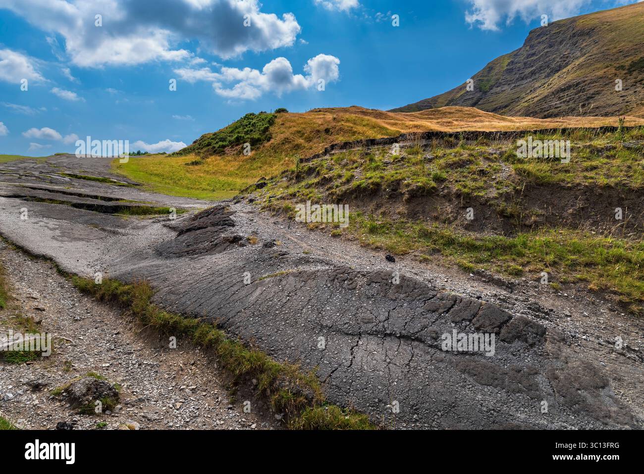 The old 'Broken Road' that once ran up the landslip of Mam Tor, now ...