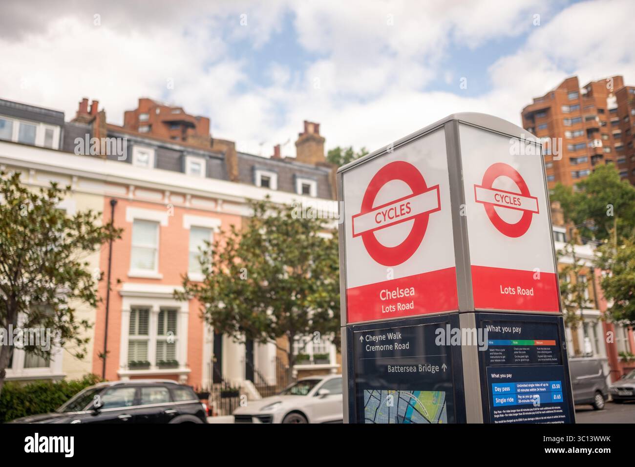 LONDON- JULY 16, 2025: TFL Cycle docking station and houses in Lots ...