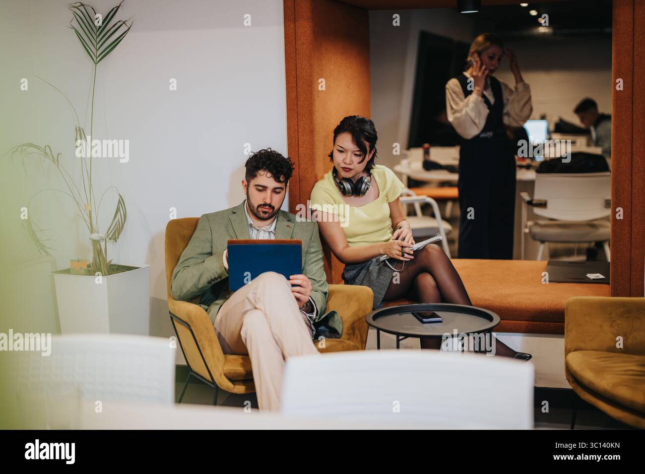 Collaborative Team Discussion in a Modern Office Setting with Digital ...