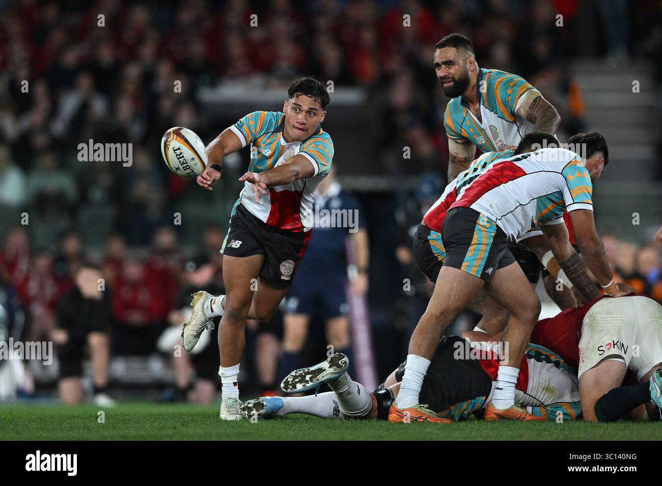 Kalani Thomas of First Nations & Pacifika passes the ball during the ...