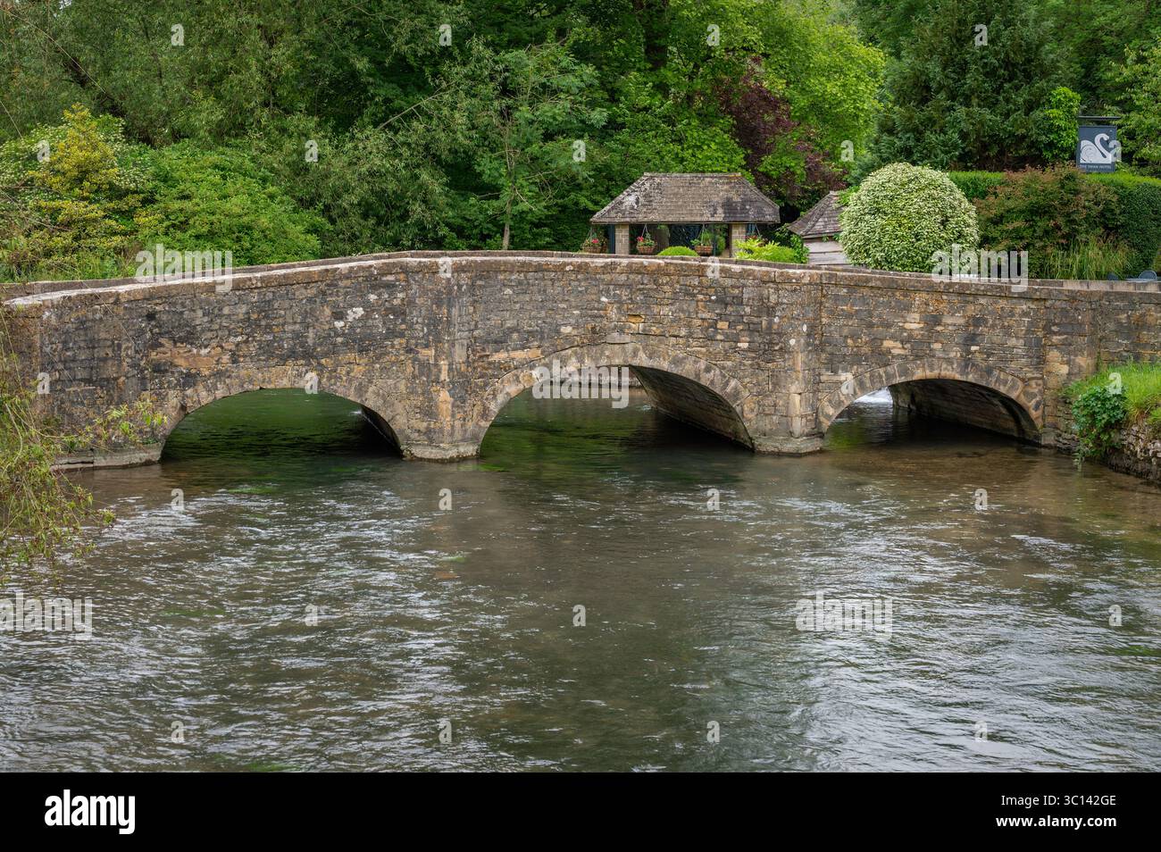 The three arched road bridge carrying B4425 across the River Coln in ...