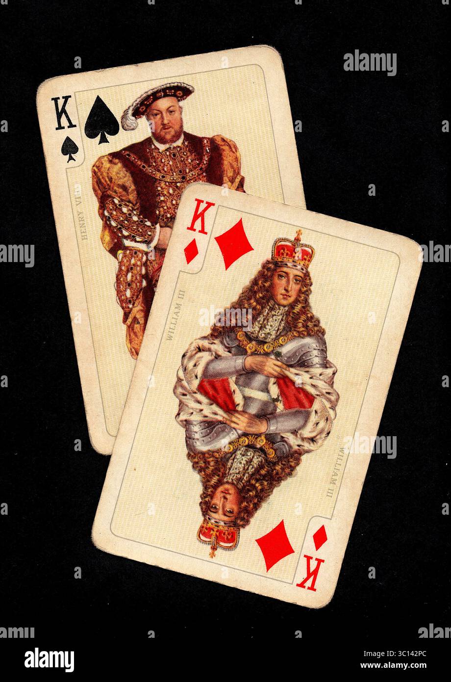 A pair of antique playing cards showing portraits of famous historical ...