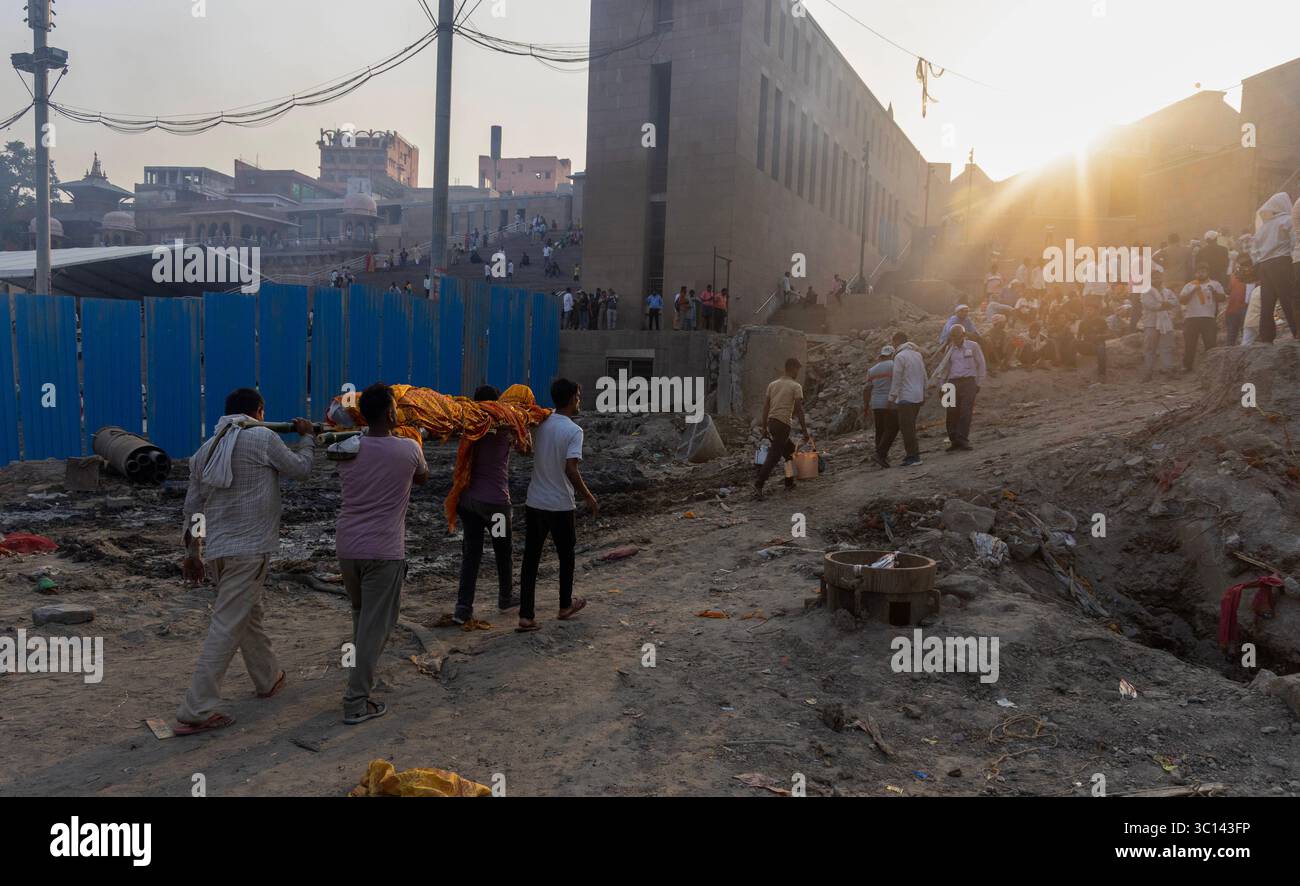 Funeral traditions and pollution at Manikarnika Ghat, in India A group ...