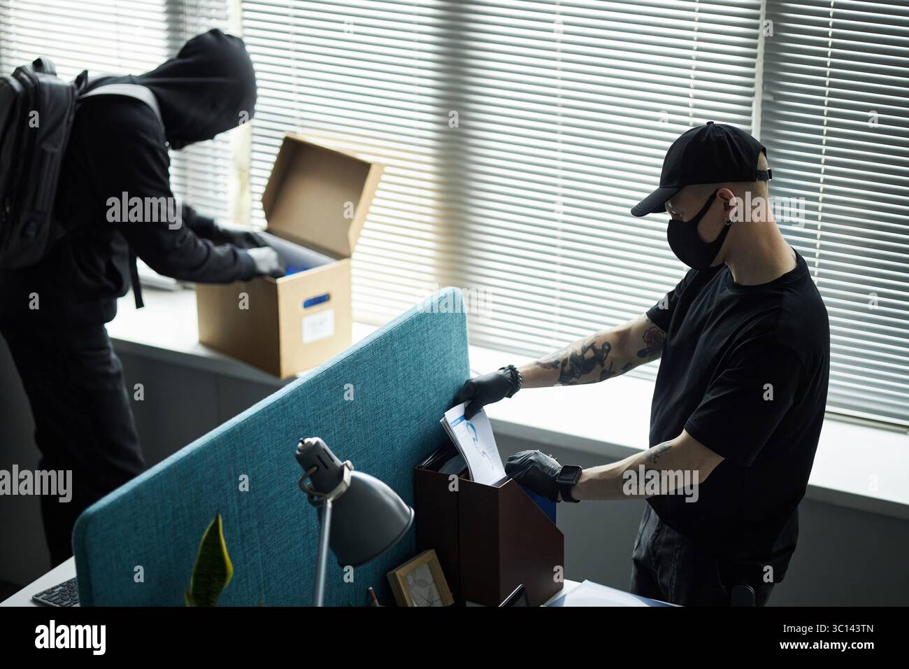 Rummaging through a box hi-res stock photography and images - Alamy