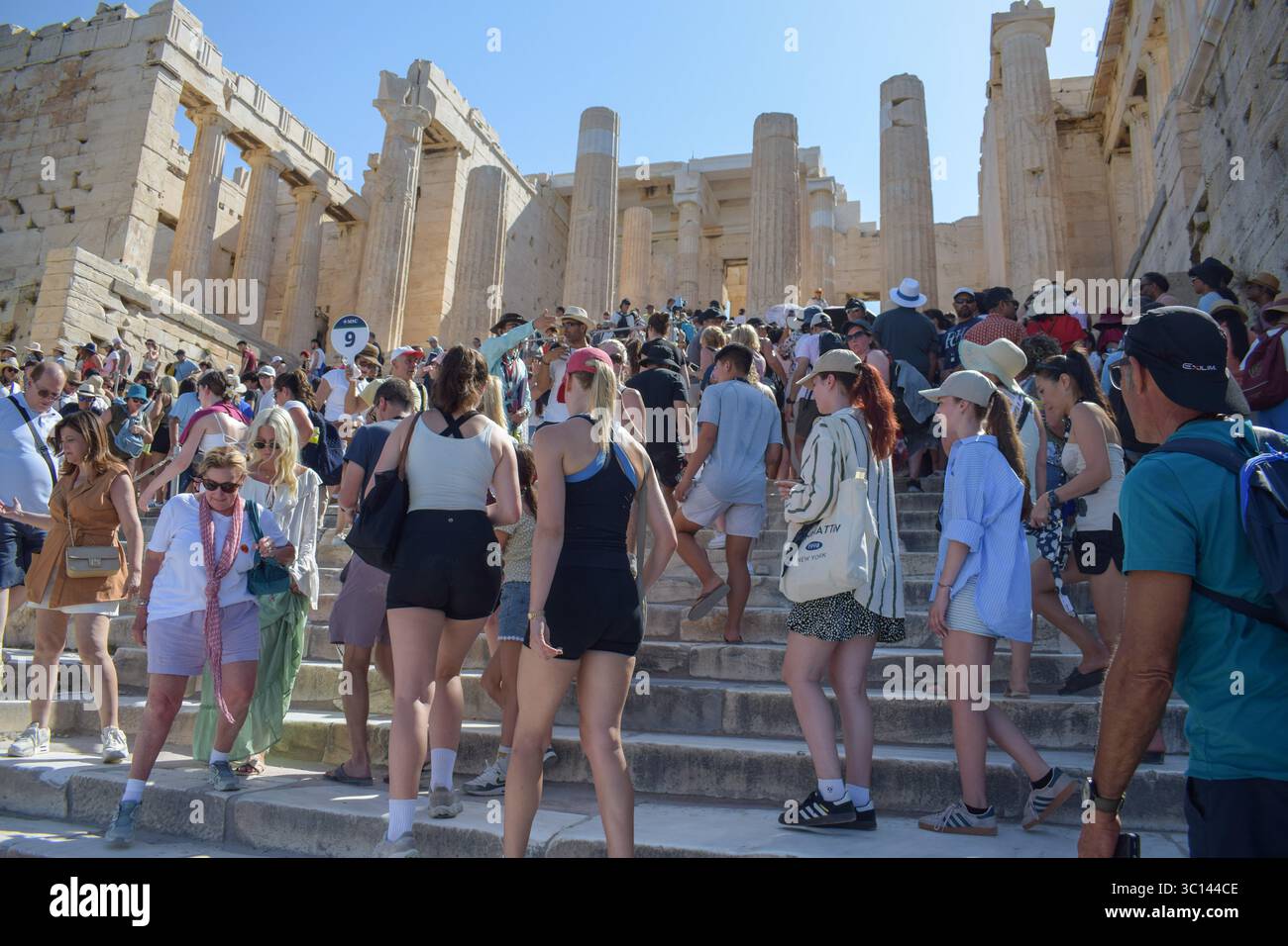 Athens, Greece, 22 July 2025. People visit the Acropolis, at the start ...