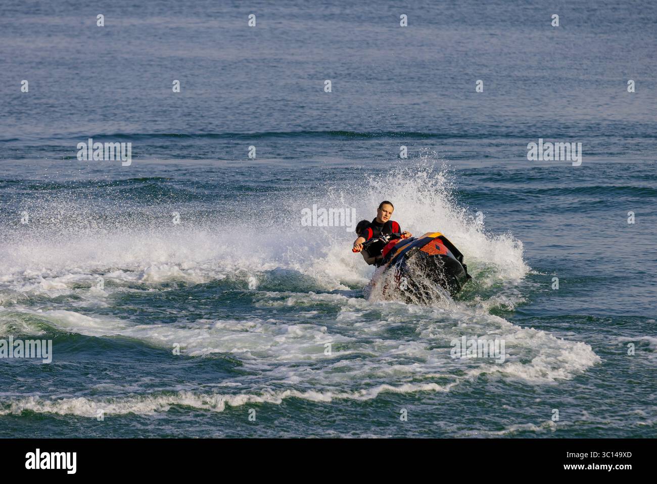 Young guy rides jet ski hi-res stock photography and images - Alamy