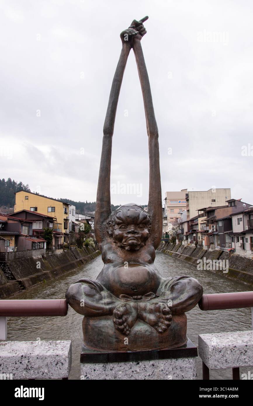 Two bronze statues of mythical creatures called ashinaga tenaga hi-res ...