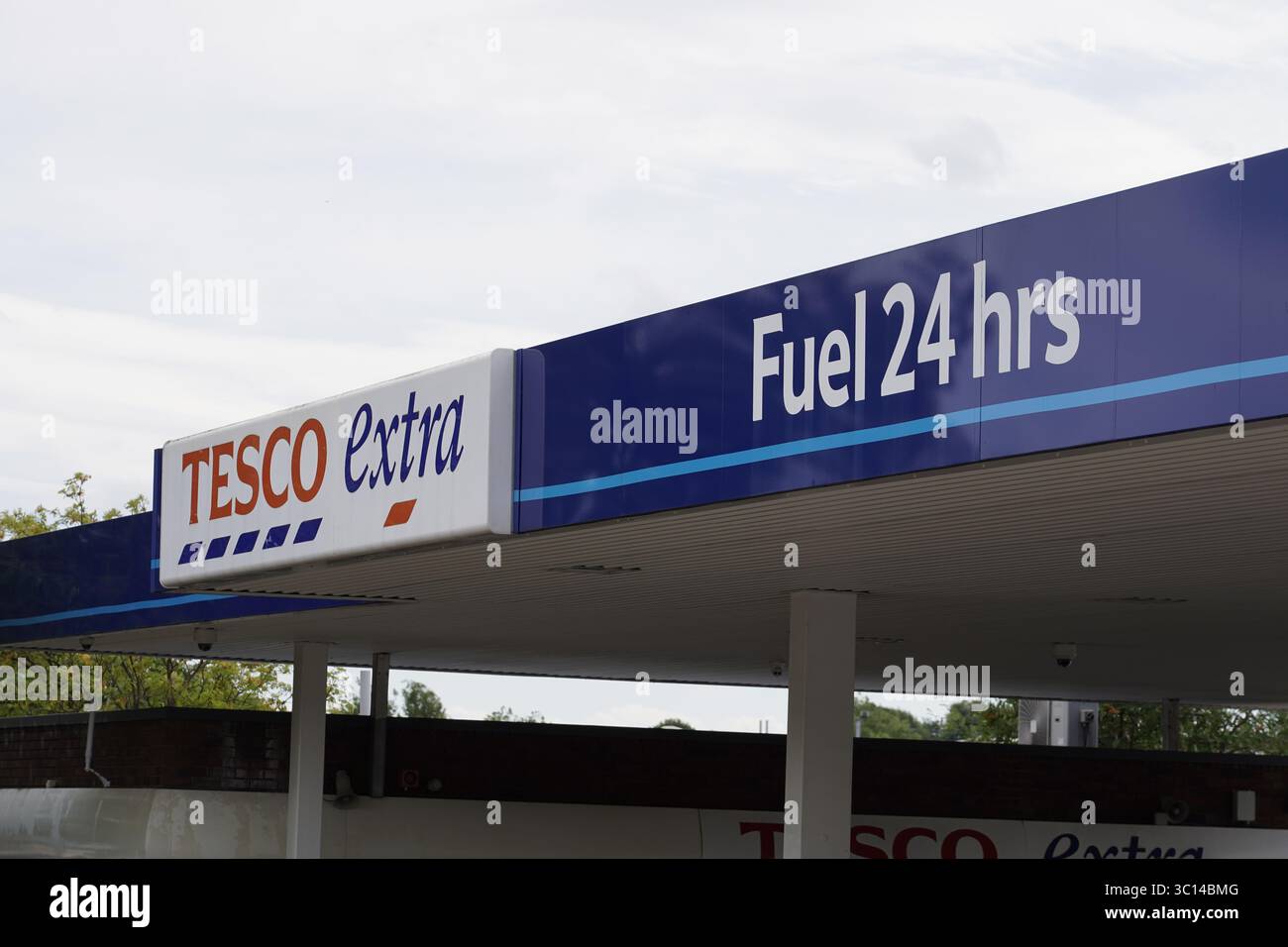 Tesco extra supermarket fuel 24 hours. Corporate logo signs in Barnsley ...