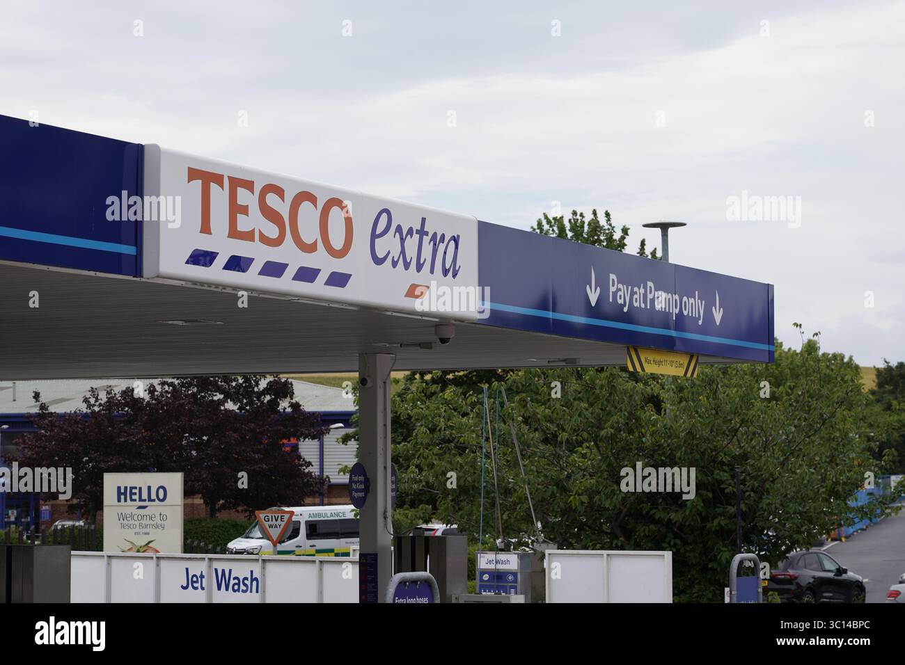 Tesco extra supermarket fuel 24 hours. Corporate logo signs in Barnsley ...