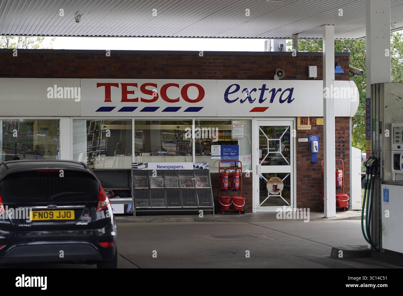 Tesco extra supermarket fuel 24 hours. Corporate logo signs in Barnsley ...