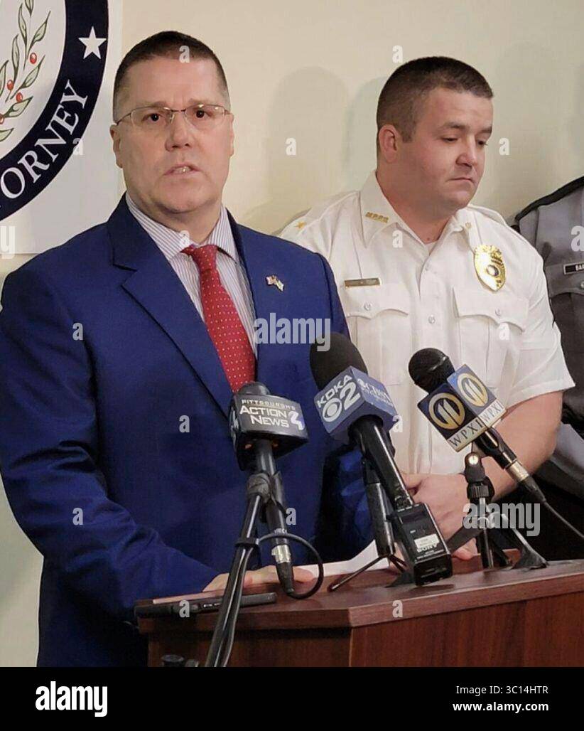Washington County District Attorney Jason Walsh speaks during a news ...