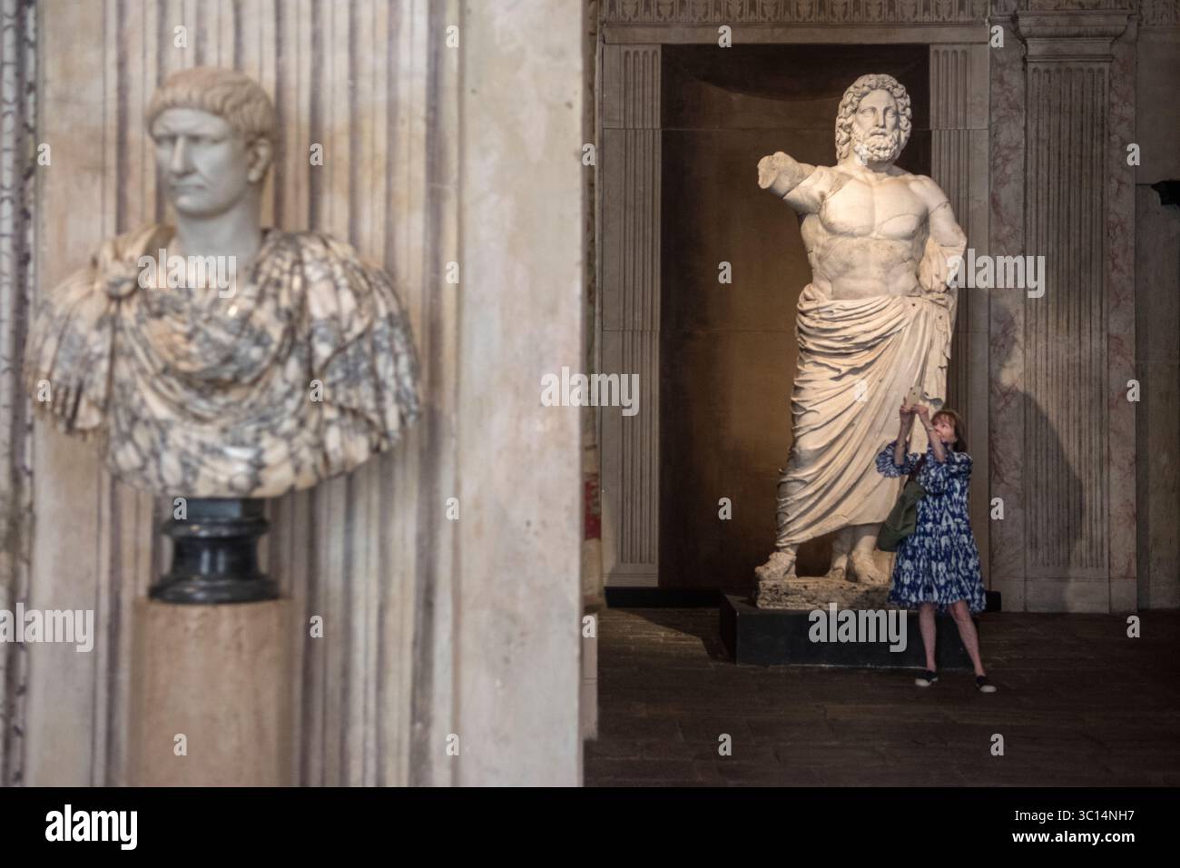 Ancient stone statue in the entrance to the Palazzo Angelo Giovanni ...