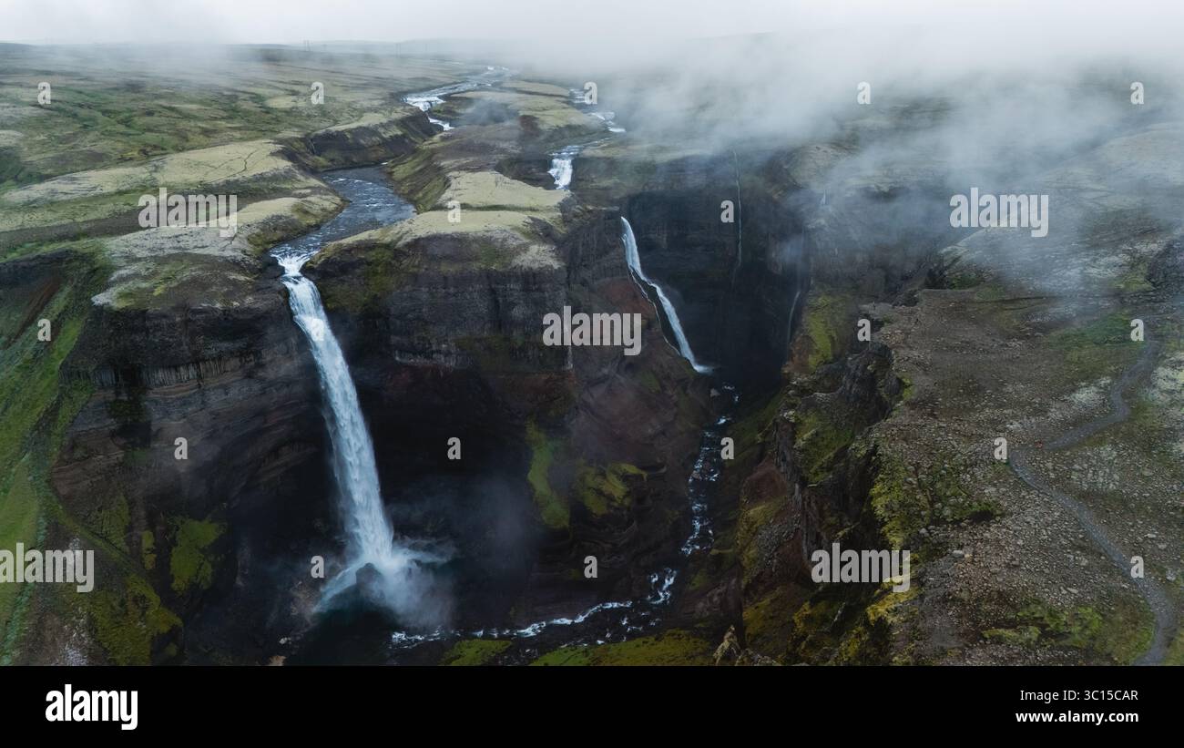 Haifoss waterfall flows powerfully over steep cliffs, creating stunning ...