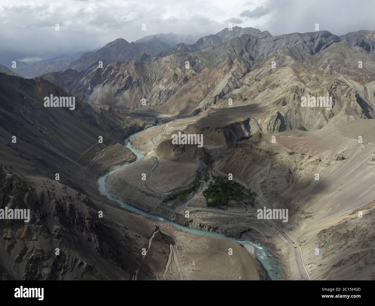 Aerial view of the winding Indus River cutting through the rugged, arid ...