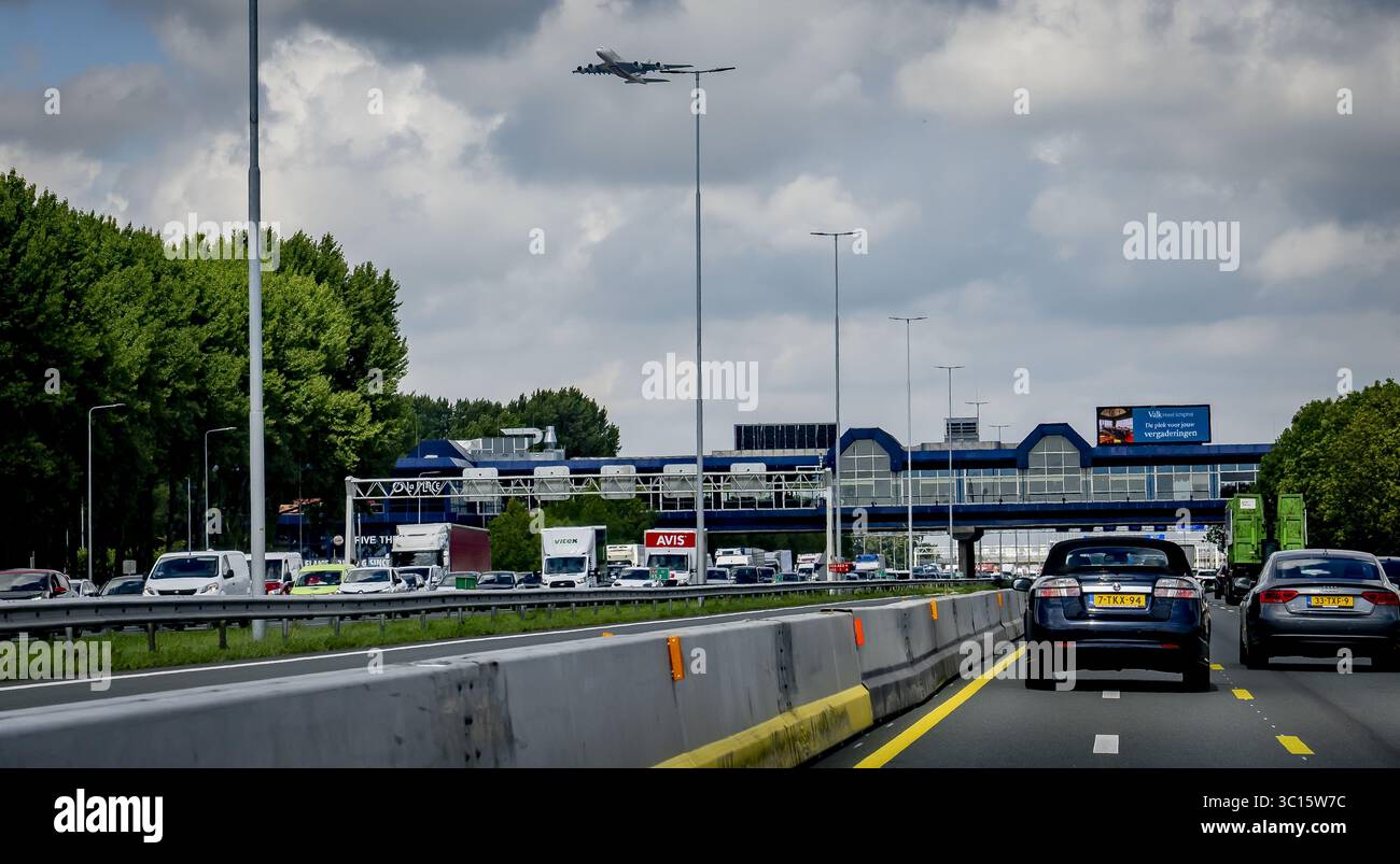 A4 - traffic jam on the highway and a plane flying overhead ANP ...