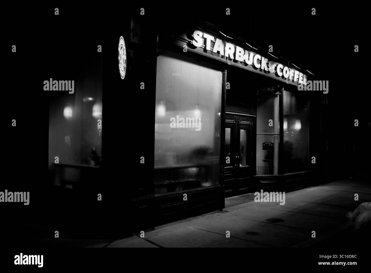 Moody night time image of a Starbucks in downtown Toronto Stock Photo ...