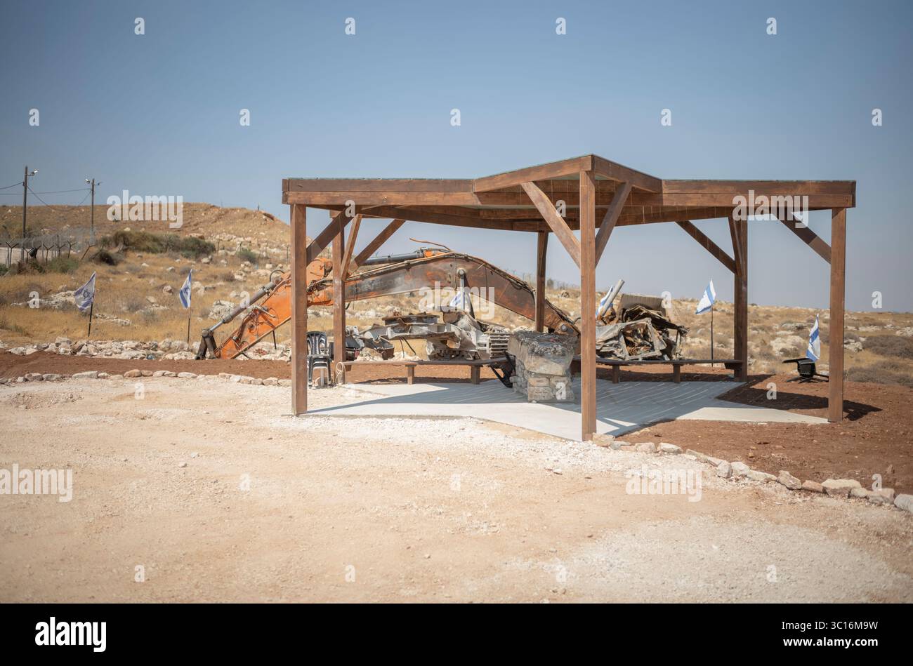 22 July 2025, Palestinian Territories, Nablus: Remains of a bagger ...
