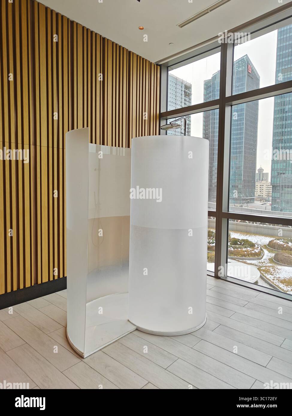 Contemporary office space showcases translucent privacy partitions ...