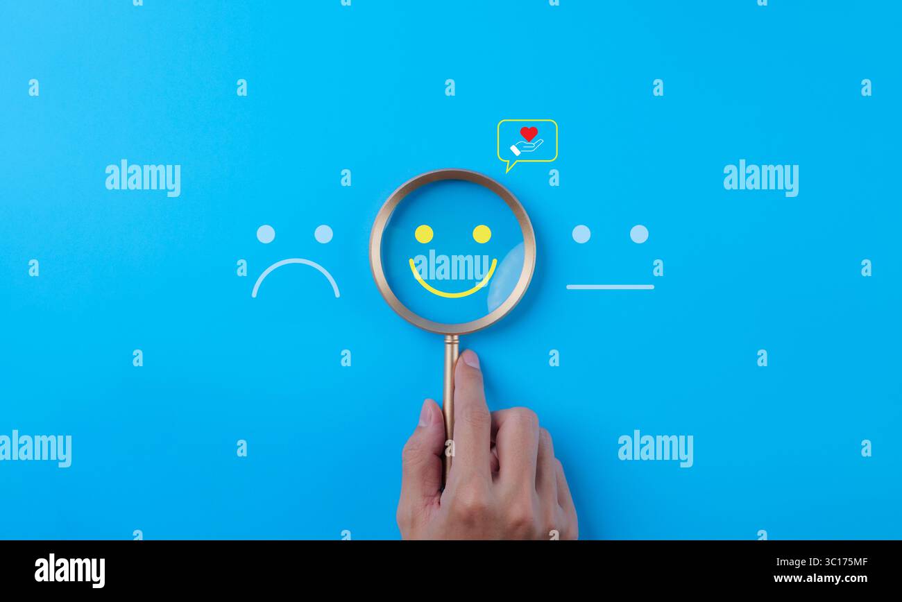 Mental Health Day concept. Magnifying glass help see a smiley face icon ...