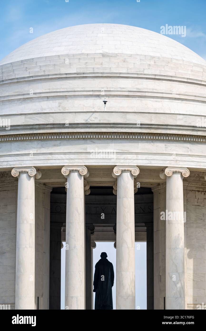 WASHINGTON DC — The bronze statue of Thomas Jefferson is silhouetted ...