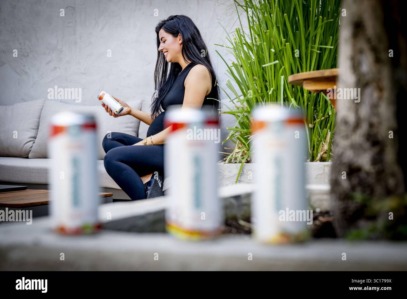 GOUDA - Portrait malou streefland with her drink nulu energy ANP ...