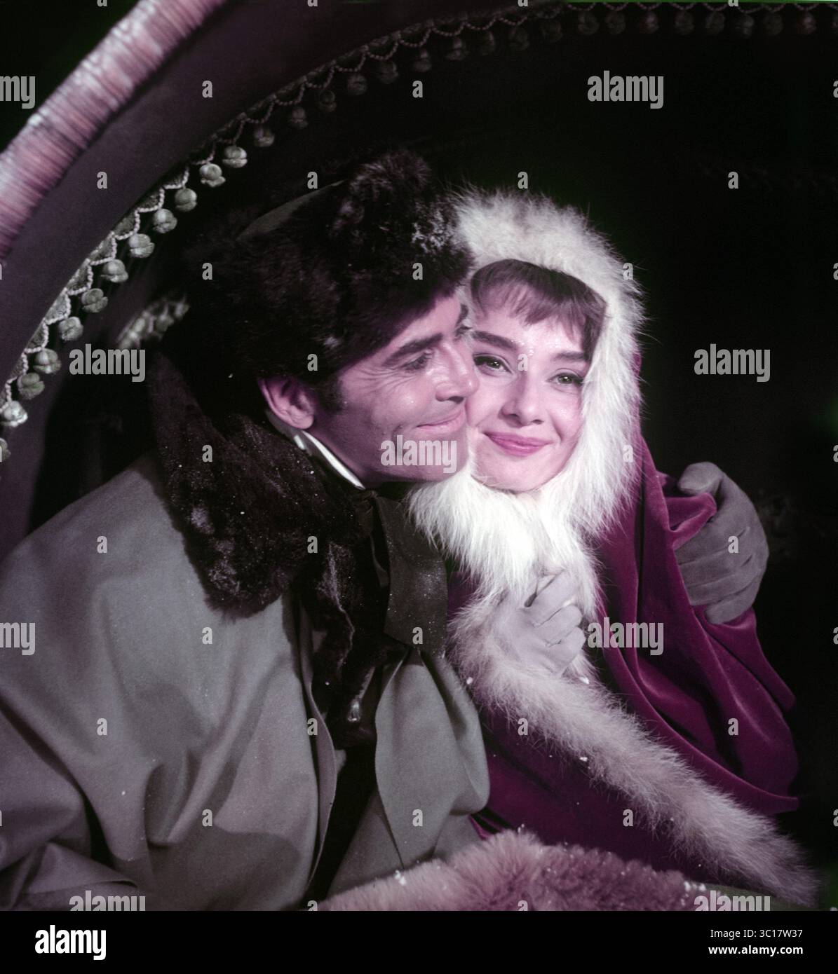 American actors Henry Fonda hugging British actress Audrey Hepburn ...