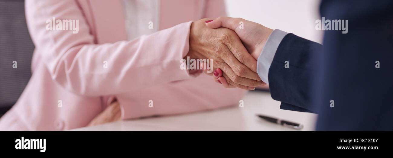 Two adult hands engage hi-res stock photography and images - Alamy