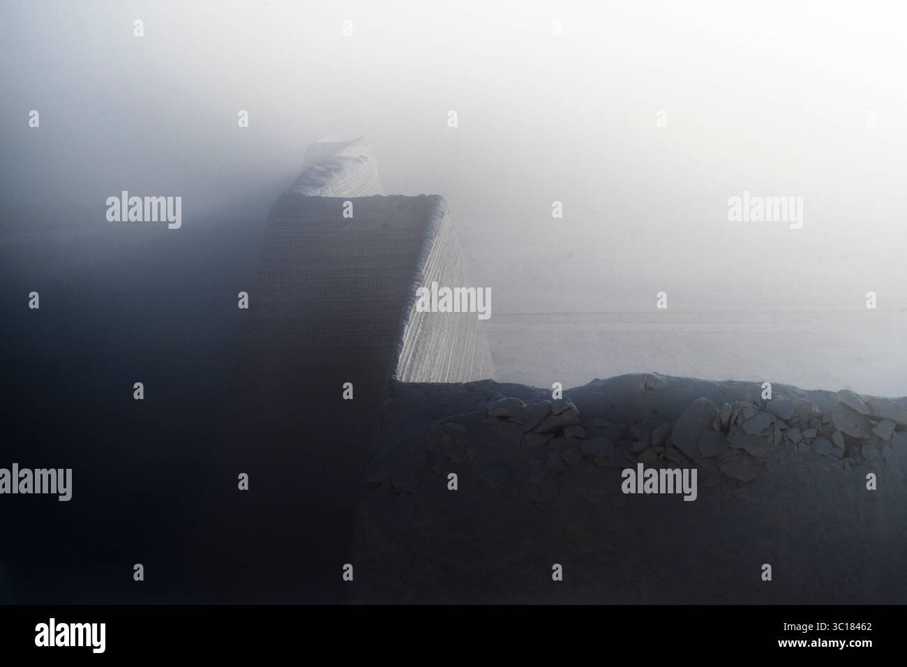 View of an abandoned limestone quarry after reaching a depth that is ...