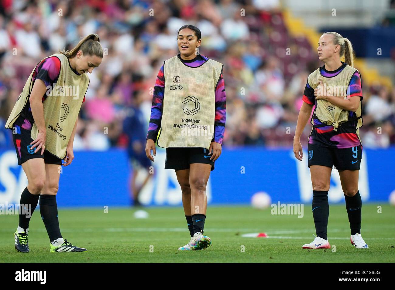 England's Jess Carter, centre, warms up prior to the Women's Euro 2025 ...
