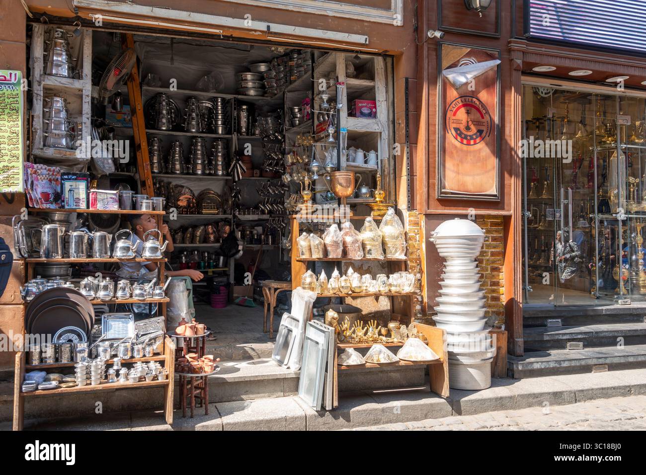 Old Cairo Street Scene with shops selling baskets and wares and hooka ...