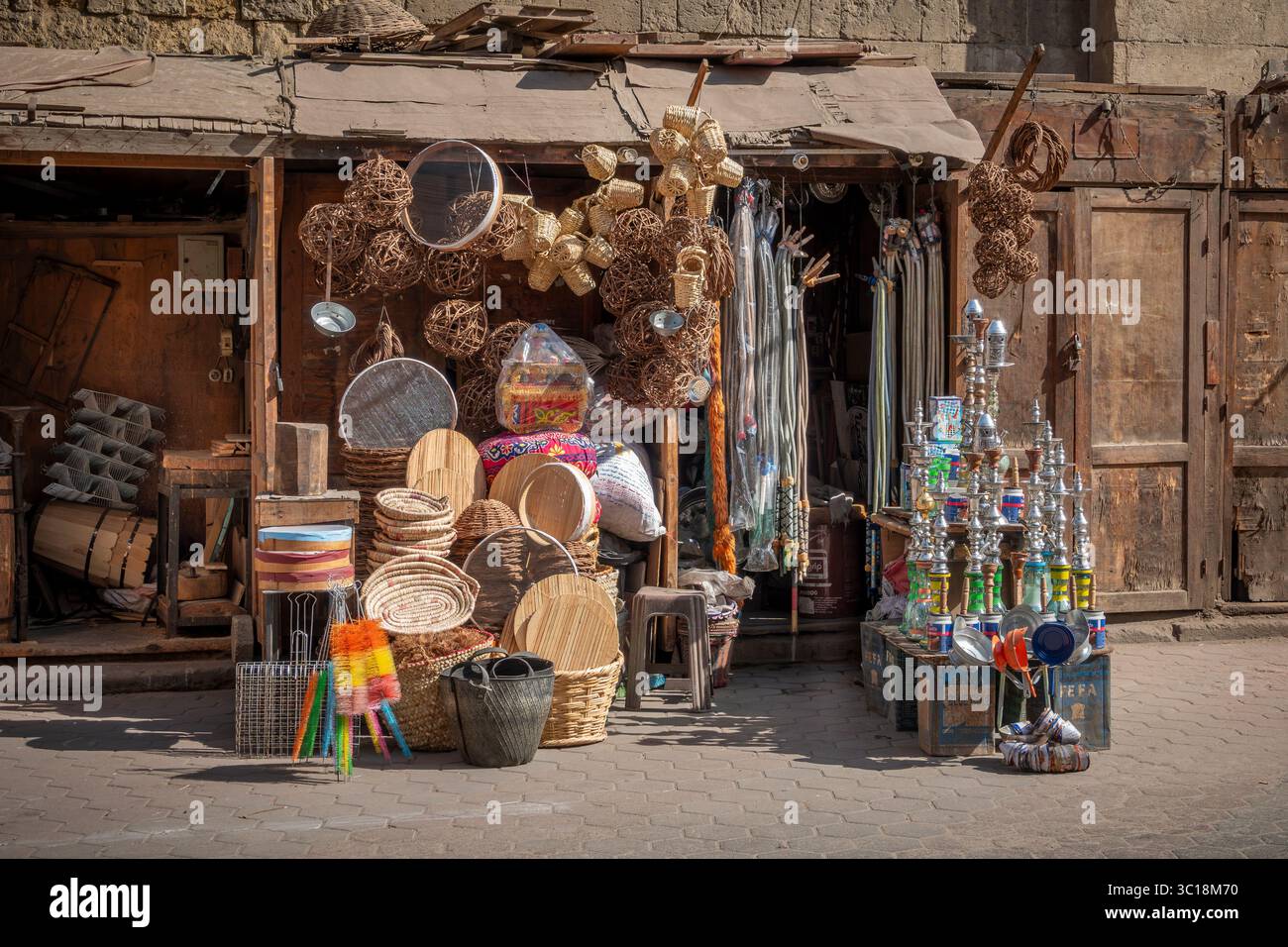 Old Cairo Street Scene with shops selling baskets and wares and hooka ...
