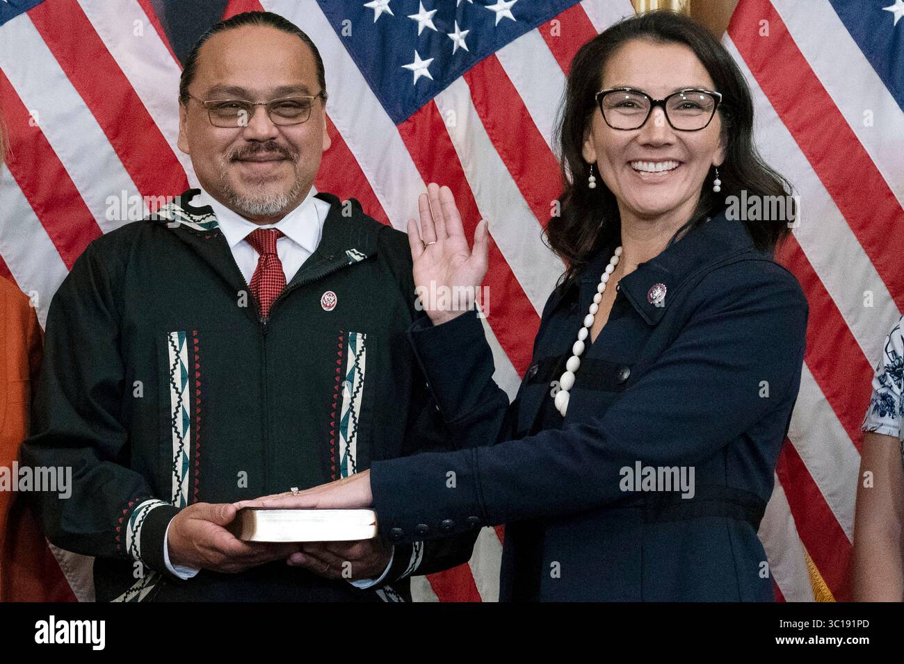 FILE - Eugene "Buzzy" Peltola Jr. holds the Bible during a ceremonial ...