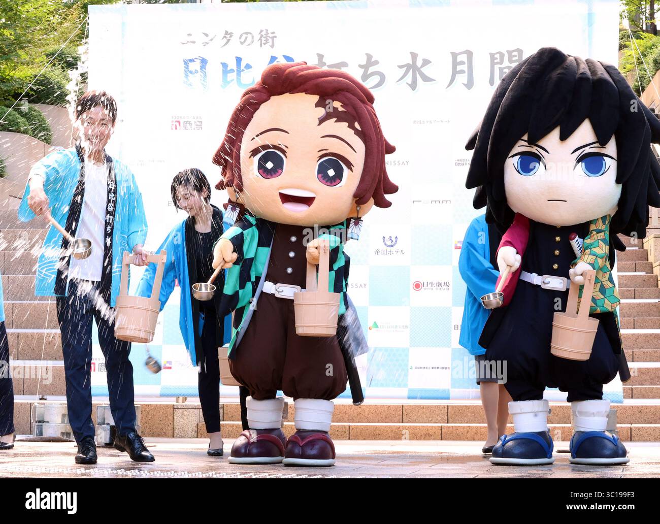 Tokyo, Japan. 22nd July, 2025. Chuo-ward Mayor Takaaki Higuchi (L) and ...