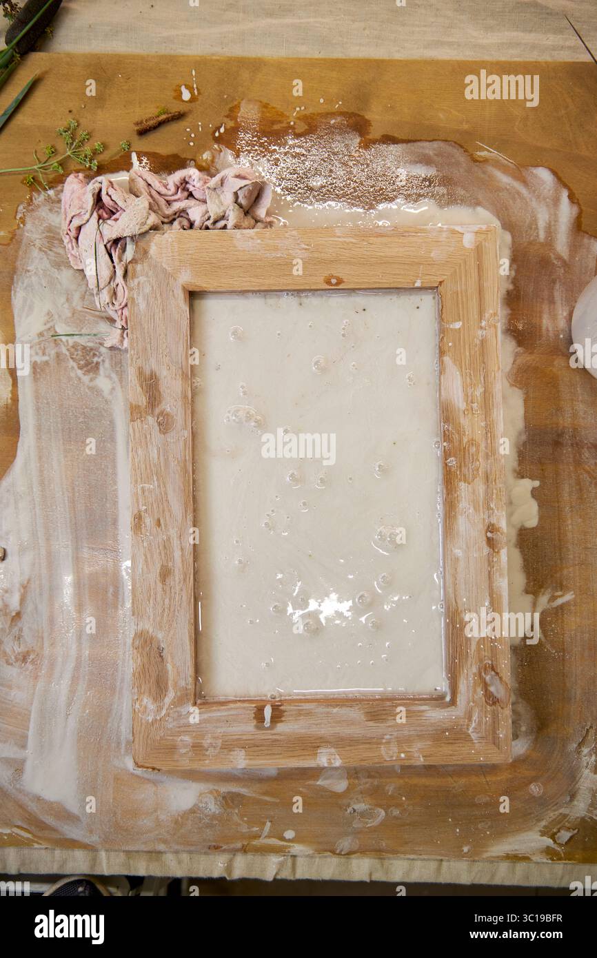 Pouring liquid plaster wooden hi-res stock photography and images - Alamy